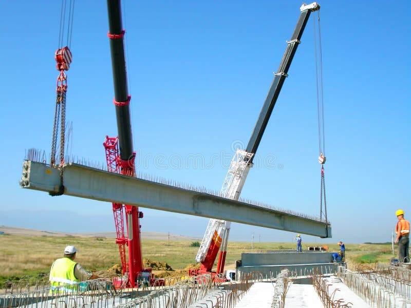 Two crane work bridge editorial photo. Image of industry - 111991601