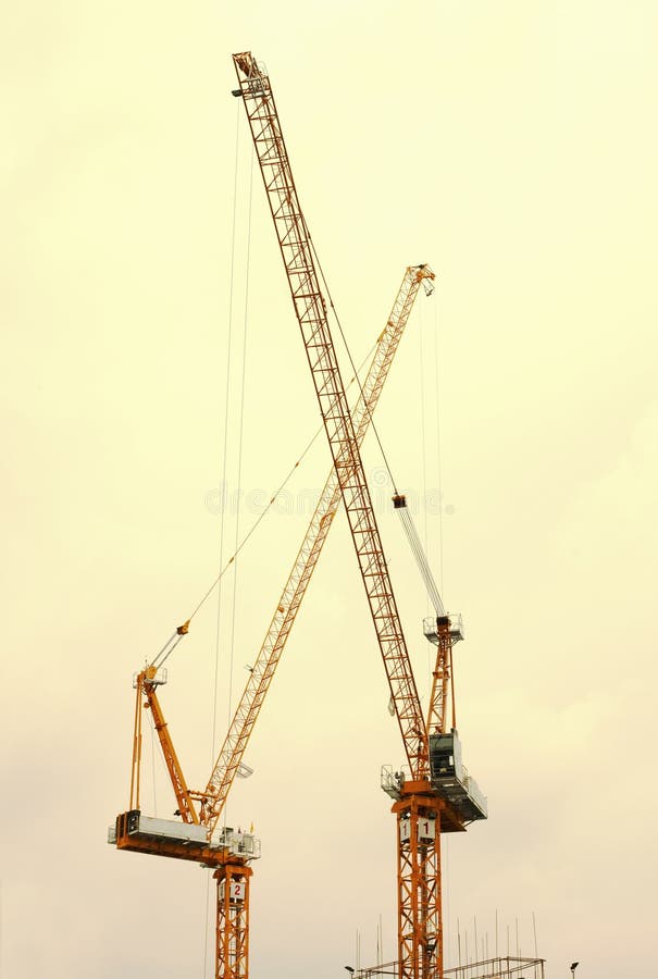 Two Cranes at Construction Site Stock Photo - Image of structure, crane ...