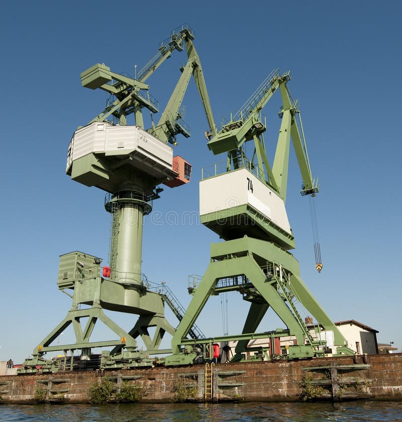 Two cranes in a harbor stock image. Image of industry - 15281487