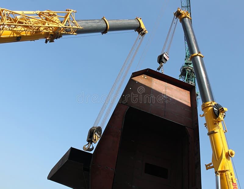 Two cranes editorial image. Image of vessel, ship, wharf - 128490705