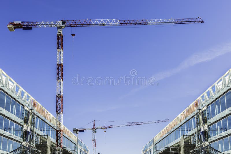 Two Cranes on a New Construction Stock Image - Image of iron, squares ...