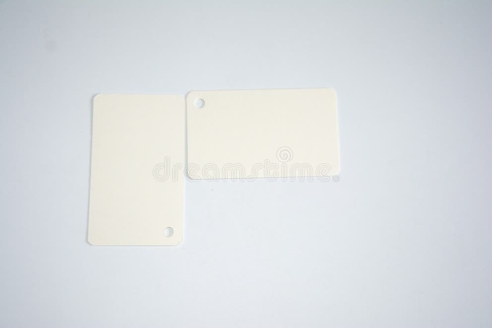 Two Cream Colored Rounded Rectangular Label Cards, Each with a Small ...