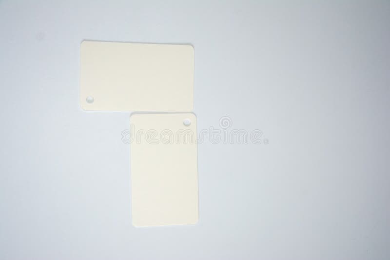 Two Cream Colored Rounded Rectangular Label Cards, Each with a Small ...