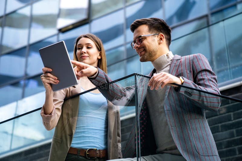 Two Creative Business People Working on Social Media Strategy Using a ...