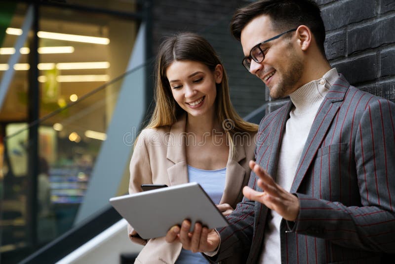 Two Creative Business People Working on Social Media Strategy Using a ...