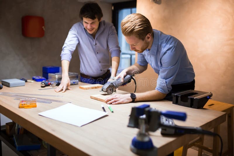 Two Creative Designers Working in Workshop Stock Photo - Image of ...