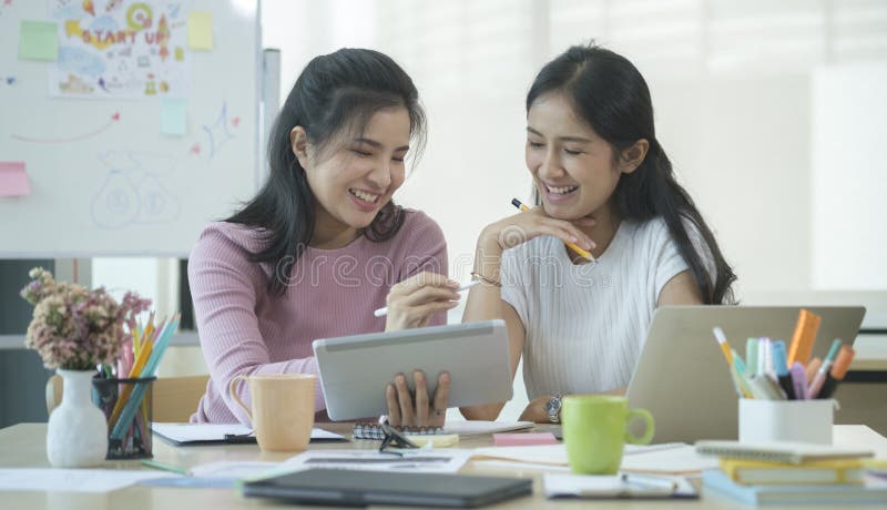 Two Creative People Working on New Project Together at Office Stock ...