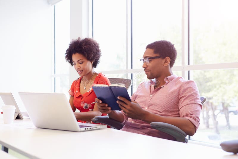 Two Creatives with Digital Tablet Working in Design Studio Stock Image ...