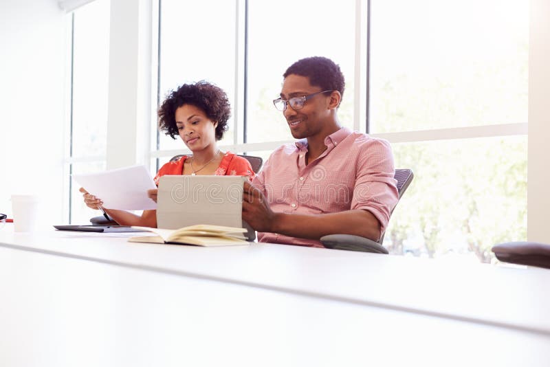 Two Creatives with Digital Tablet Working in Design Studio Stock Image ...