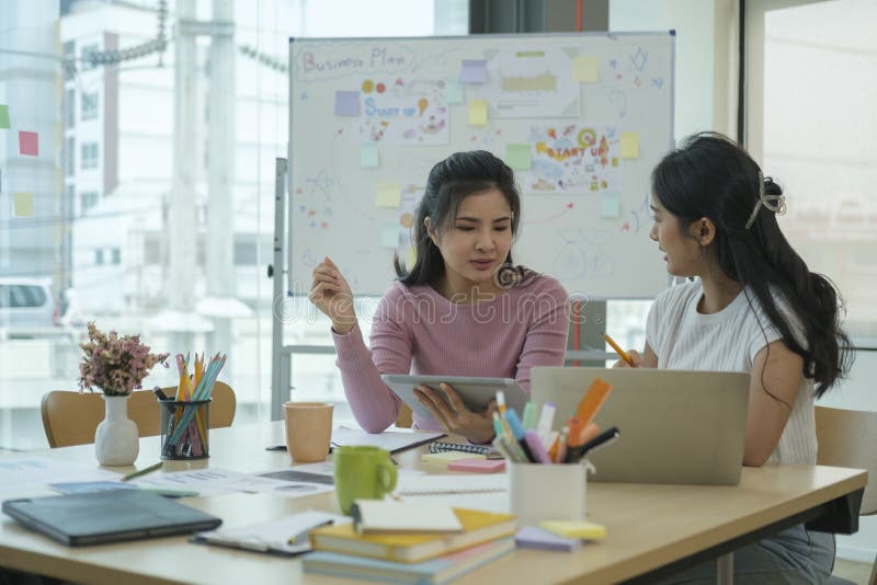 Two Creatives Women Working Working on Project Together in Design ...