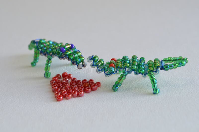 Two crocodile with beads stock image. Image of crocodile - 48374133