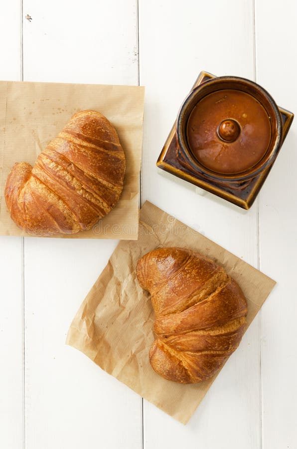 Two Croissant Over Wooden Table Stock Photo - Image of multiple, fresh ...
