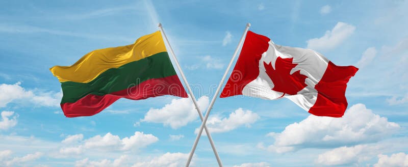 Two Crossed Flags Canada and Lithuania Waving in Wind at Cloudy Sky ...