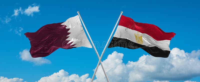 Two Crossed Flags Egypt and Qatar Waving in Wind at Cloudy Sky. Concept ...