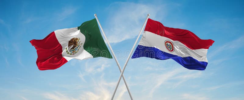 Two Crossed Flags Paraguay and Mexico Waving in Wind at Cloudy Sky ...