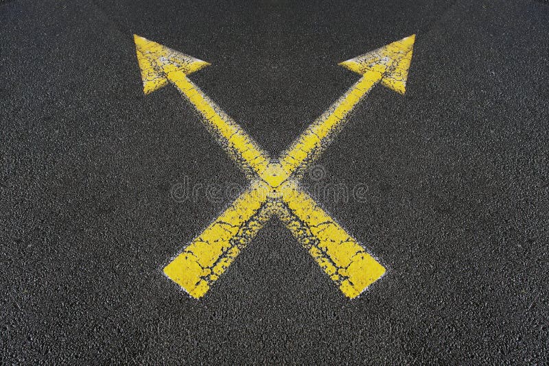 Two crossed yellow arrows stock image. Image of indication - 49547415
