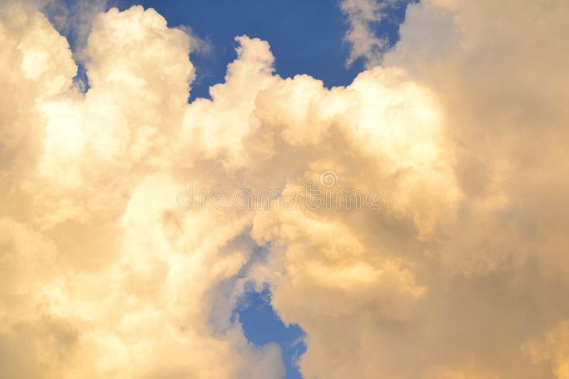 Two Cumulonimbus Clouds Colliding in the Bright Blue Sky Stock Photo ...