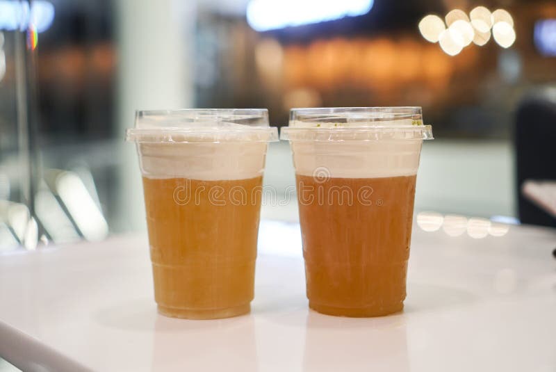 Two Cup of Cheese Tea Drinks. Stock Image - Image of hand, creamy ...
