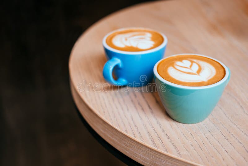 Two cups of cappuccino stock image. Image of blue, antioxidant - 112676643