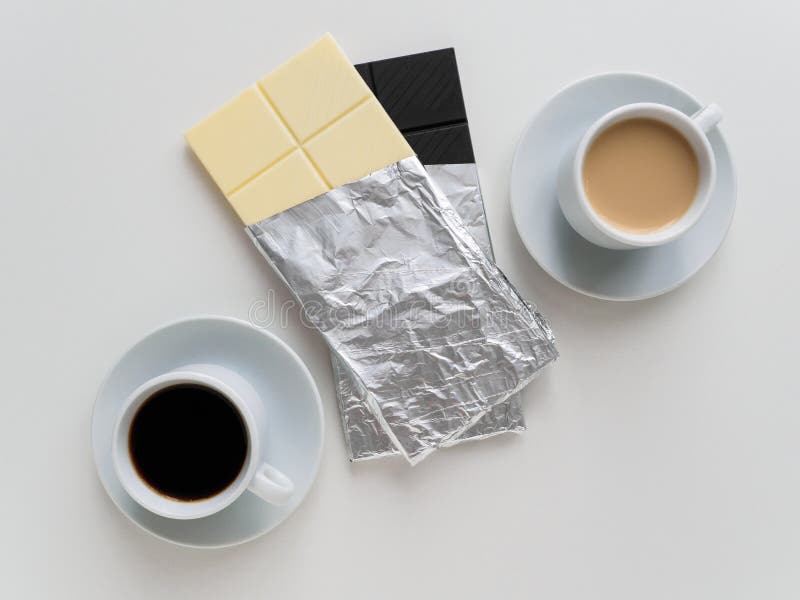 Two Cups of Coffee and Two Bars of Different Chocolate Stock Image ...
