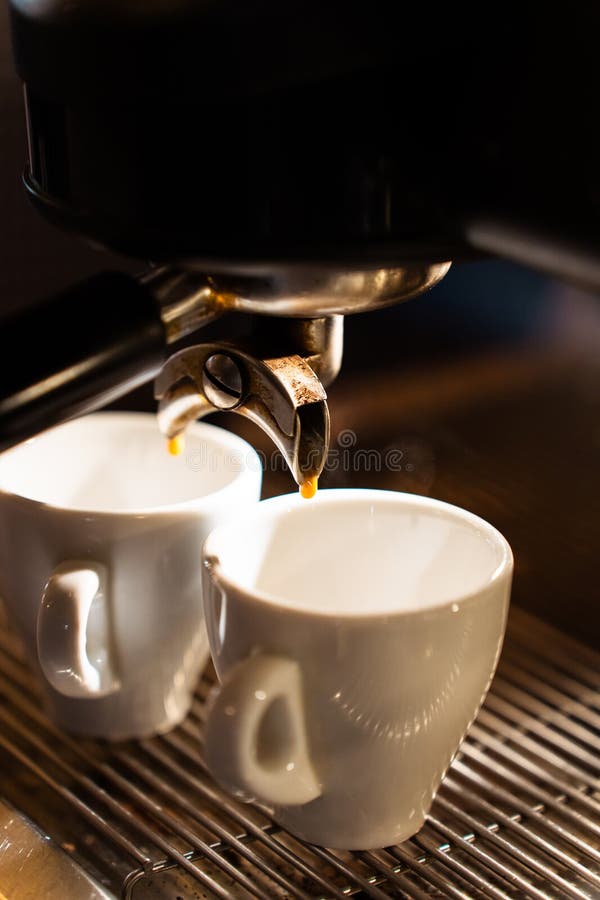 Two Cups of Coffee Brewing Together in the Restaurant& X27;s Coffee ...