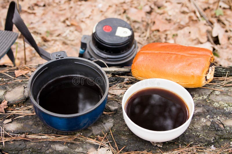 Two Cups of Coffee with a Bun. Coffee Break. Snack in the Forest Stock ...