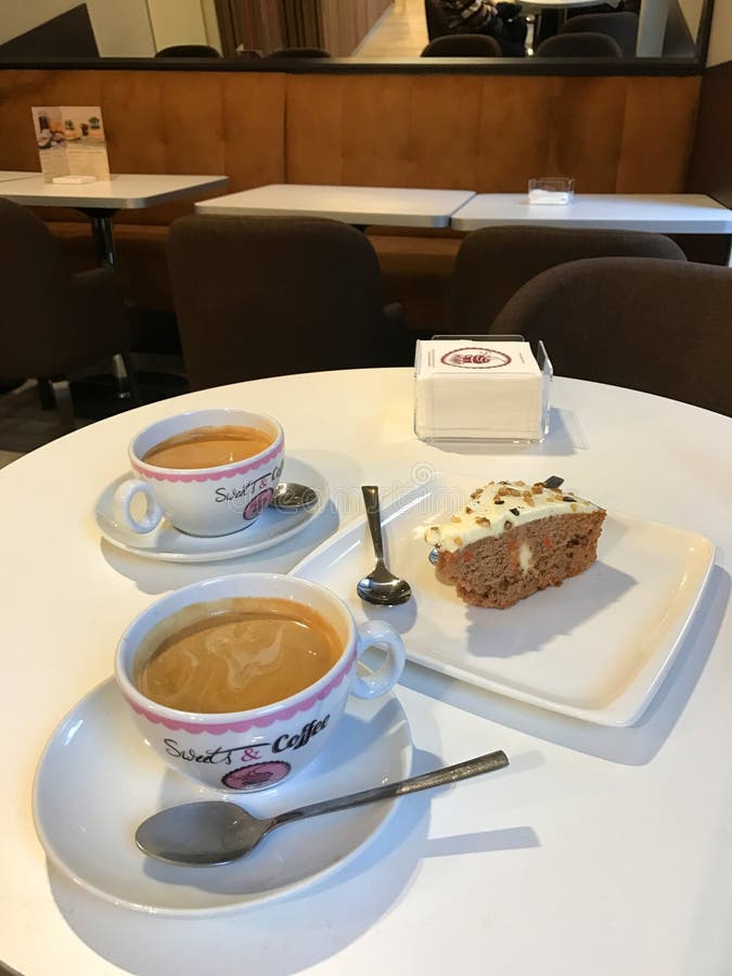 Two Cups of Coffee and Carrot Cake in a Cafeteria. Stock Photo - Image ...