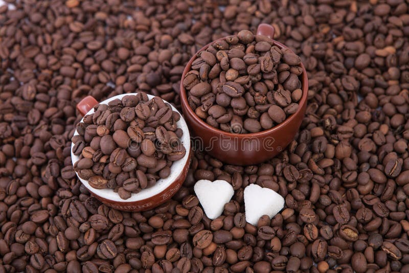 Two Cups of Coffee Full of Coffee Beans. Close-up Stock Photo - Image ...