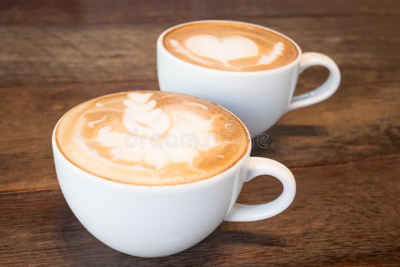Two Cups of Coffee Latte Art Stock Photo - Image of cups, food: 103445706 Two Cups of Coffee Latte Art Stock Photo - Image of cups, food: 103445706