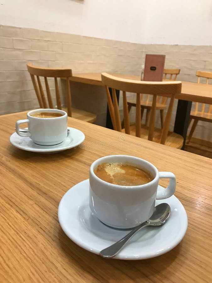 Two Cups of Coffee on a Table Stock Image - Image of color, cups: 353151357