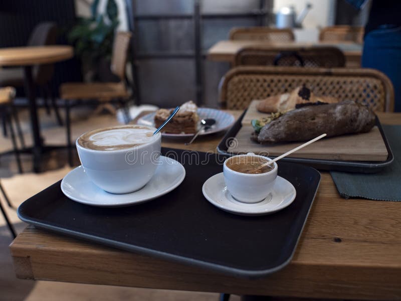 Two Cups of Coffee on the Table. Morning Breakfast at the Cafe Stock ...