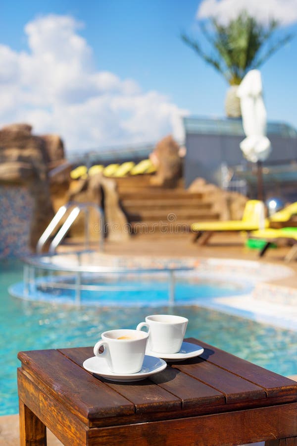 Two Cups of Coffee on the Table Near the Pool Stock Photo - Image of ...
