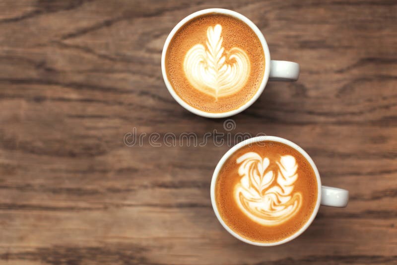 Two Cups of Coffee on Wood Table Stock Image - Image of italian ...