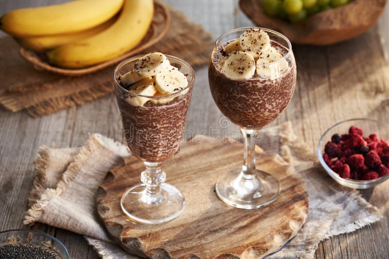 Two Cups of Healthy Chia Chocolate Pudding with Fresh Banana Slices ...