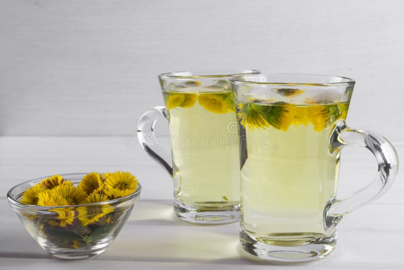 Two Cups of Herbal Tea with Coltsfoot Stock Photo - Image of close ...