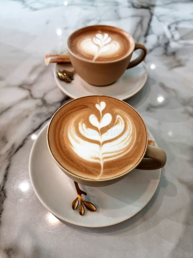 Two Cups of Hot Latte Art Simple Tulip Coffee on Stock Photo - Image of ...