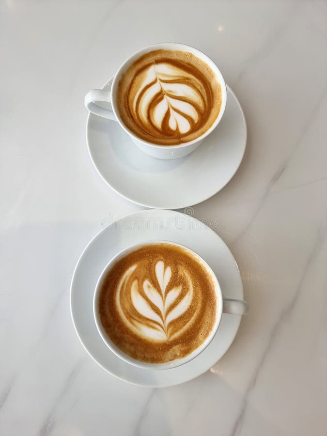 Top View of Two Cups of Hot Latte Art Tulip Coffee Stock Photo - Image ...