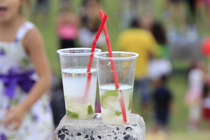 Two cups of lemon juice stock image. Image of straws - 74754803
