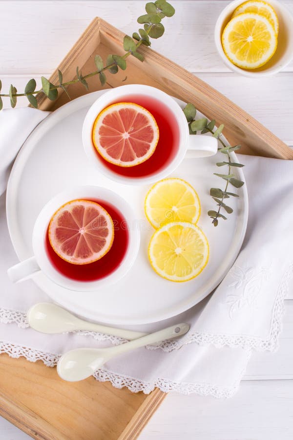 Two Cups of Red Fruit and Herbal Tea with Lemon Slice, Stock Image ...