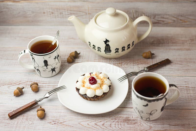 Two Cups of Tea and Cake on the Table Stock Photo - Image of bowl ...