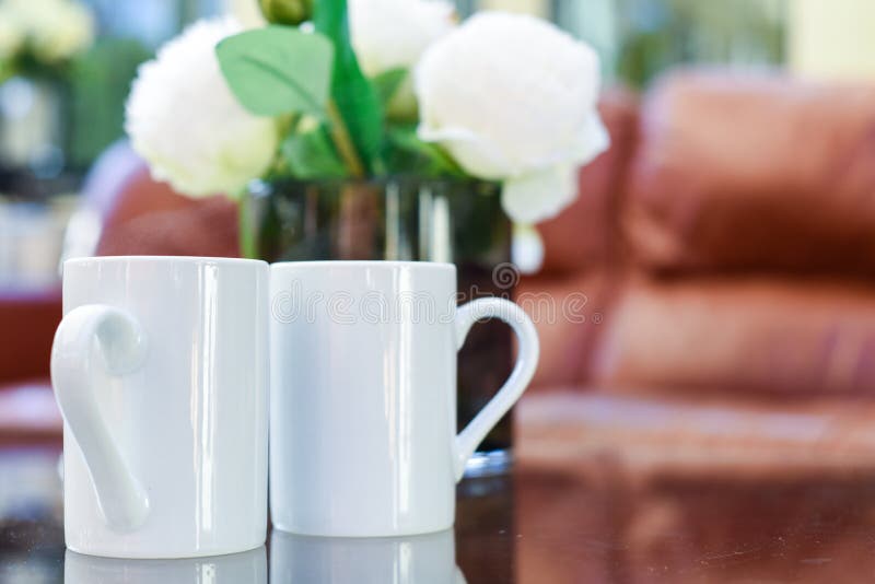 Two Cups of Tea or Coffee Together on a Coffee Table in a Light Home ...