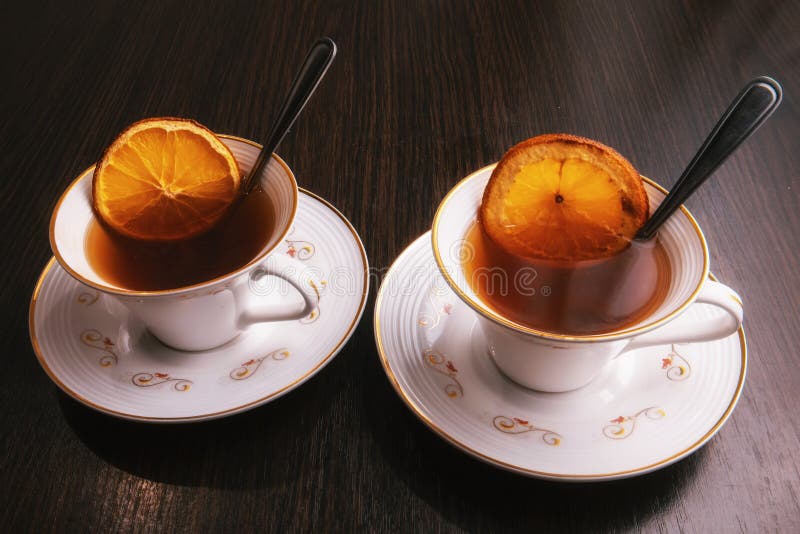 Two Cups of Tea with Dried Oranges Stock Photo - Image of orange ...