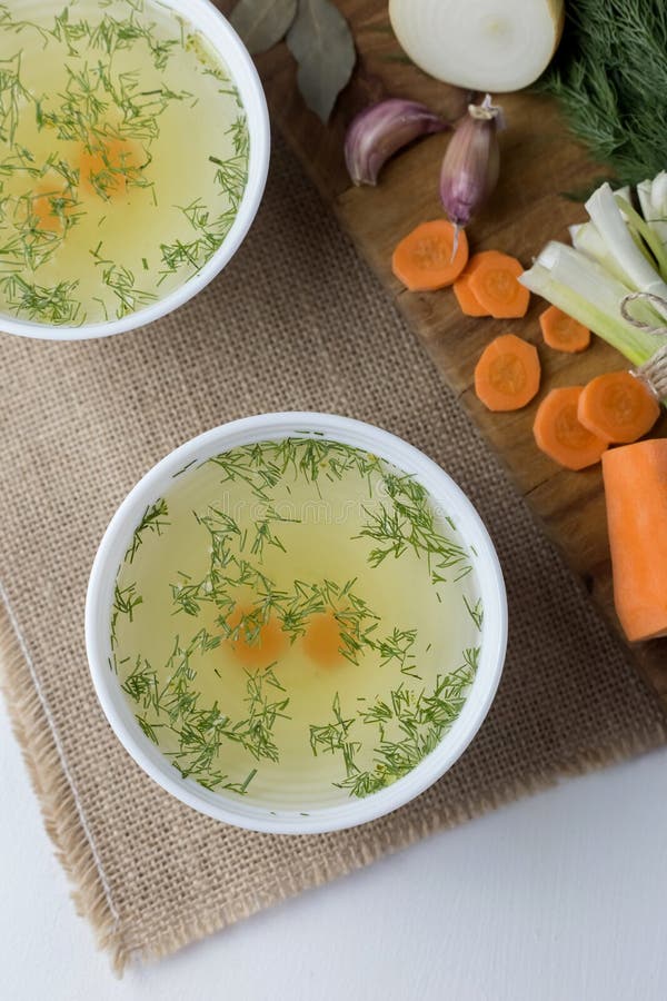 Two Cups with Vegetable Broth are on the Table Stock Image - Image of ...