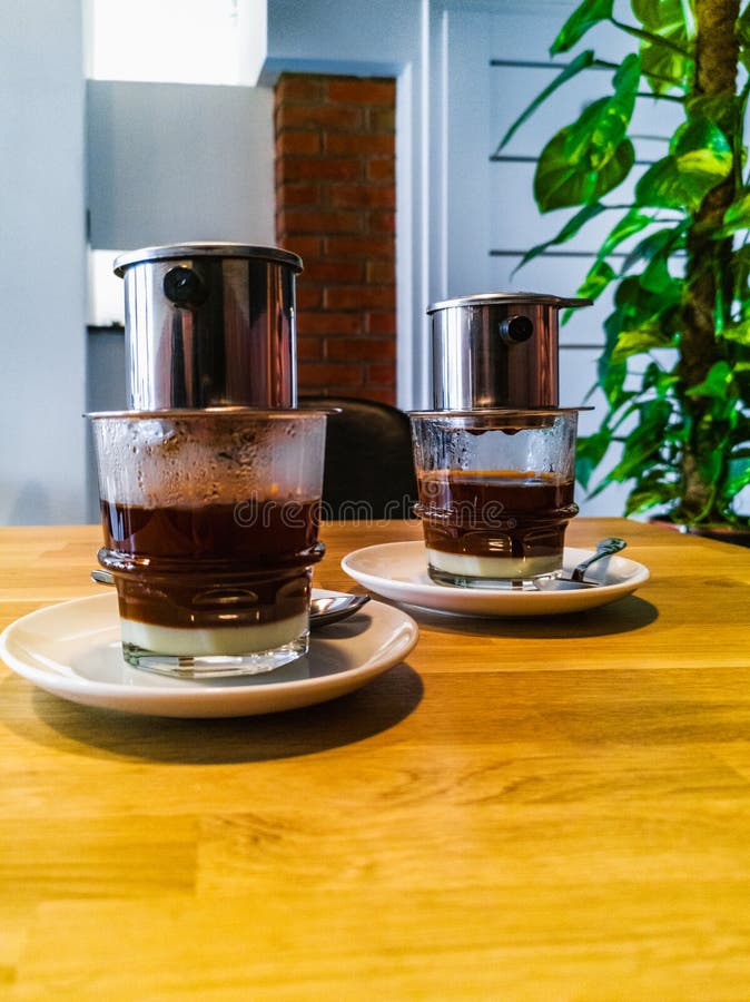 Two Cups with Vietnamese Coffee, Standing on a Small Table Stock Image ...