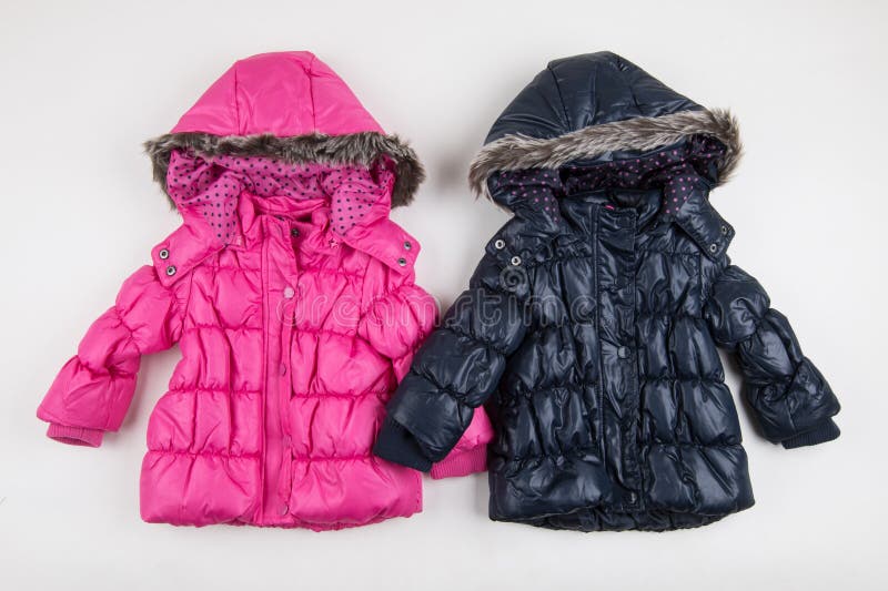 Cute Blue and Pink Children`s Winter Jackets Stock Photo - Image of ...