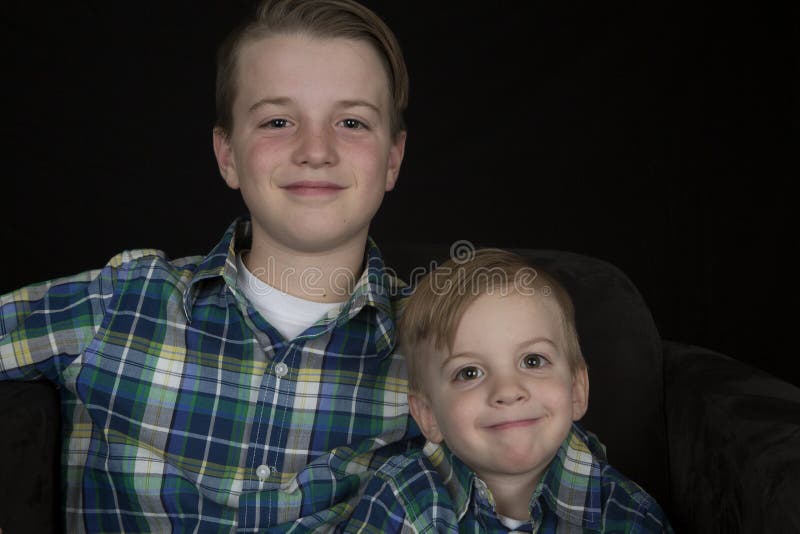 Two Cute Brothers Portrait Wearing Matching Shirts Smiling at Ca Stock ...