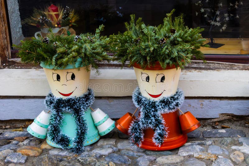 Two Cute Flower Pots Sitting on the Sidewalk Stock Photo - Image of ...