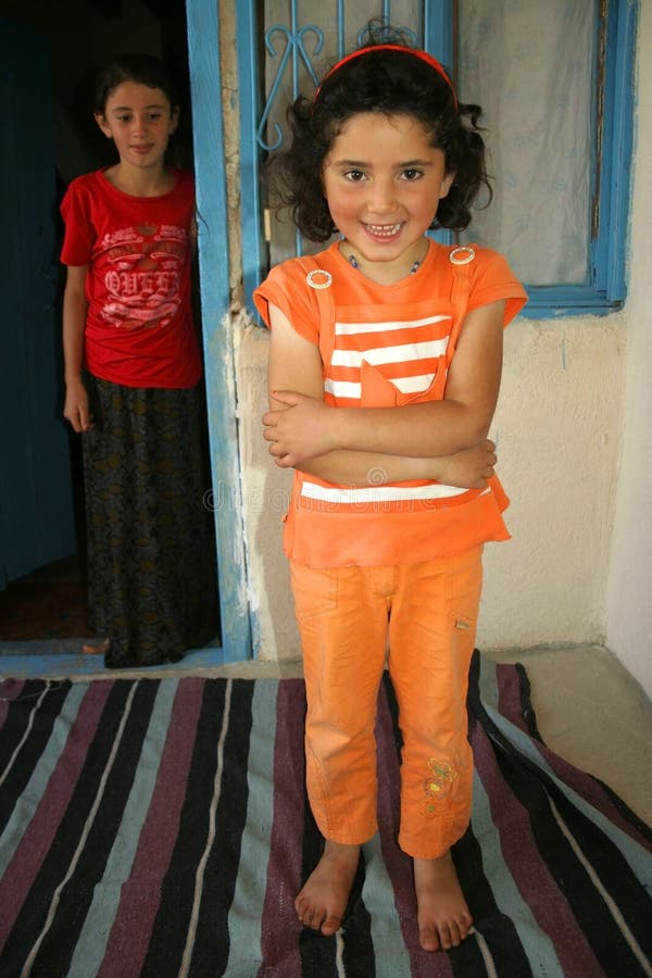 Two cute girls stock image. Image of helping, charity - 6281751