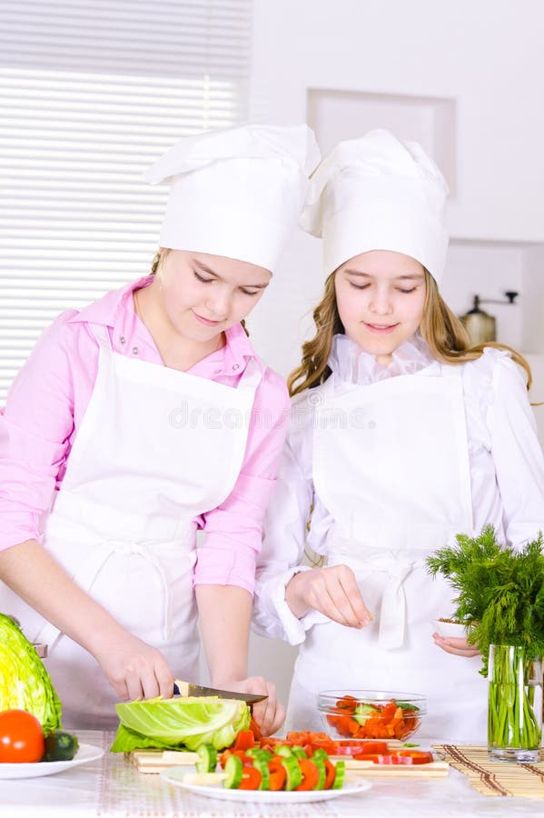 Portrait of Two Cute Girls Cooking on Kitchen Stock Image - Image of ...