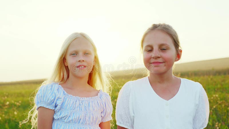 Two Cute Girls in a Field at Sunset Stock Footage - Video of happiness ...